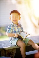 Happy Boy Reading Bible
