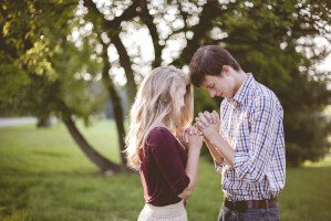 Couple Standing Praying