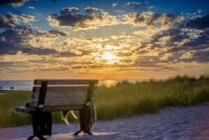 Sunset on the Beach by Bench