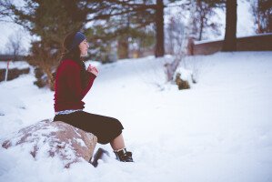 Girl Praying in Snow
