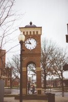 Couple Under Clock Tower