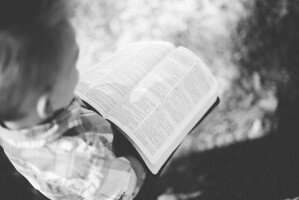 Child With Bible Black and White