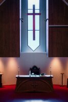 A Cross Above A Desk
